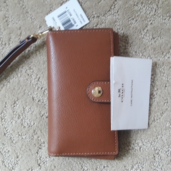 Coach | Bags | Coach Saddle Leather Phone Clutch Still Has Tags | Poshmark
